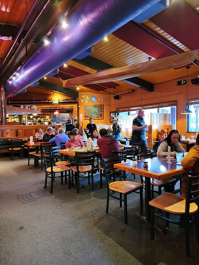 The only thing more satisfying than the food at Moose's Tooth? The happy faces of fellow diners enjoying their Alaskan pizza paradise.