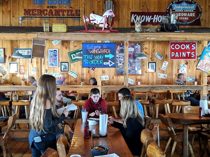 Families gather around wooden tables, proving that good food still has the power to pull teenagers away from their phones&mdash;if only temporarily.