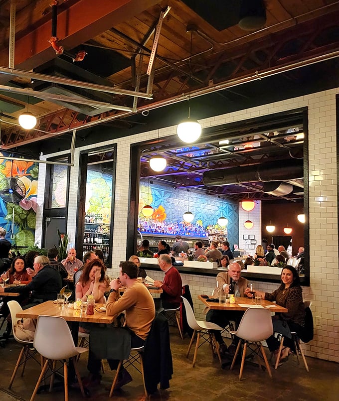 The dining room hums with the energy of people having the kind of evening they'll describe to friends with unrestrained enthusiasm.