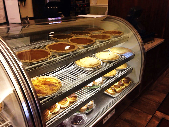 Behold, the shrine of sweetness! This display case is like a museum of deliciousness, showcasing edible masterpieces that would make even the Louvre jealous.