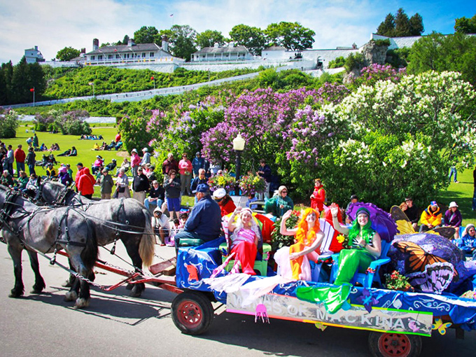 Lilacs and horse-drawn floats: Mackinac's idea of a traffic jam. It's like a parade and a garden party had a beautiful, blooming baby.