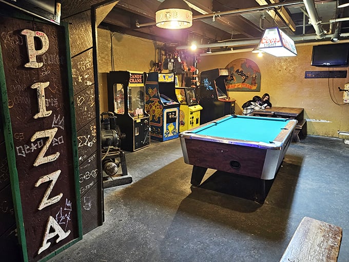 Game on! This retro arcade corner is where you can work up an appetite for your next slice.