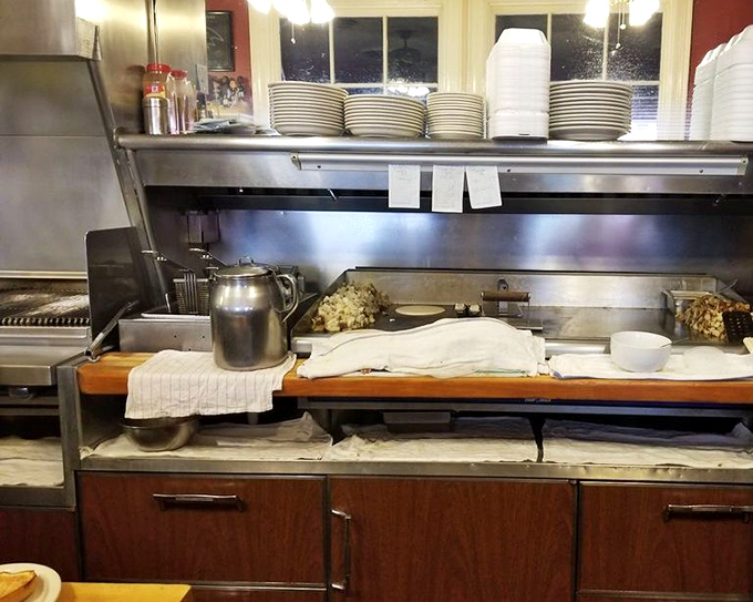 Where the magic happens! This grill has seen more action than a Hollywood stuntman, and it's just getting warmed up for the day.