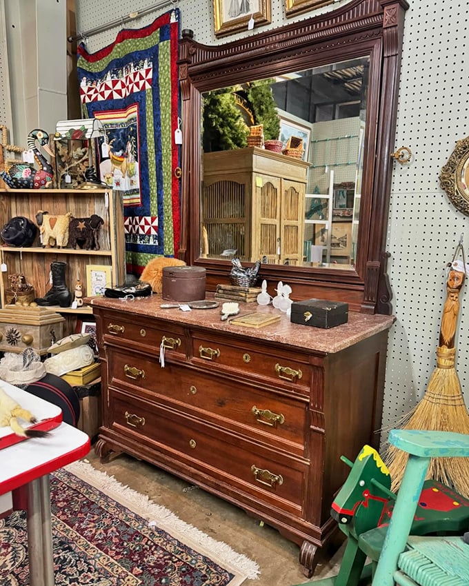 Mirror, mirror, on the... dresser? This vignette screams "I Love Lucy" meets "Downton Abbey" &ndash; and we're here for it!