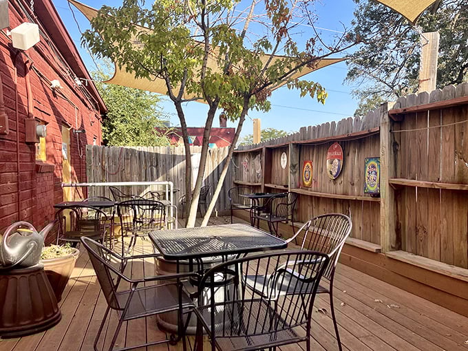 Who needs a beach when you've got this charming outdoor oasis? Sip, savor, and pretend you're on a coastal getaway – just don't expect any seagulls to steal your fries.