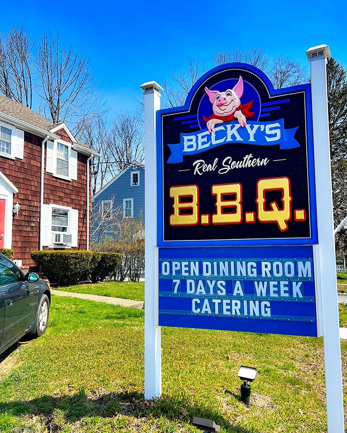 The beacon of BBQ hope! This sign is like a lighthouse guiding hungry souls to the promised land of smoky delights.