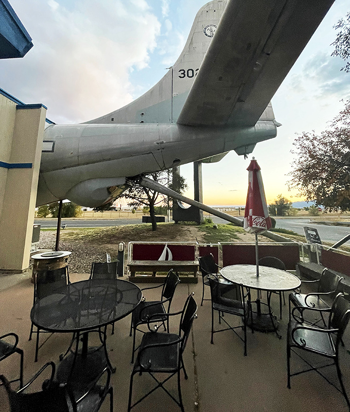Outdoor seating with a view that can't be beat. Where else can you enjoy your meal under the wing of a genuine aircraft?