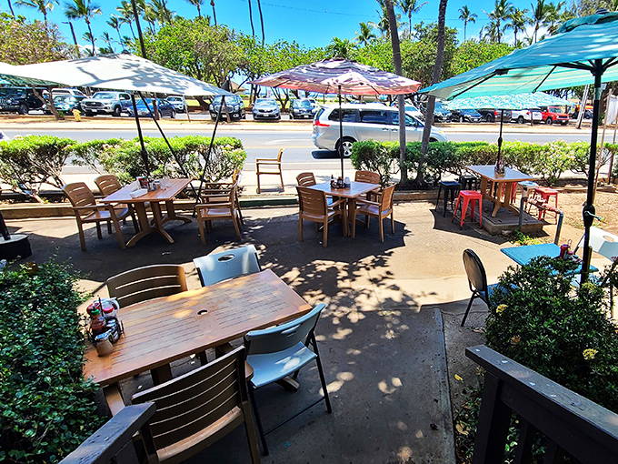Al fresco feast! These outdoor tables offer a side of sunshine with your breakfast, perfect for soaking up those laid-back island vibes.