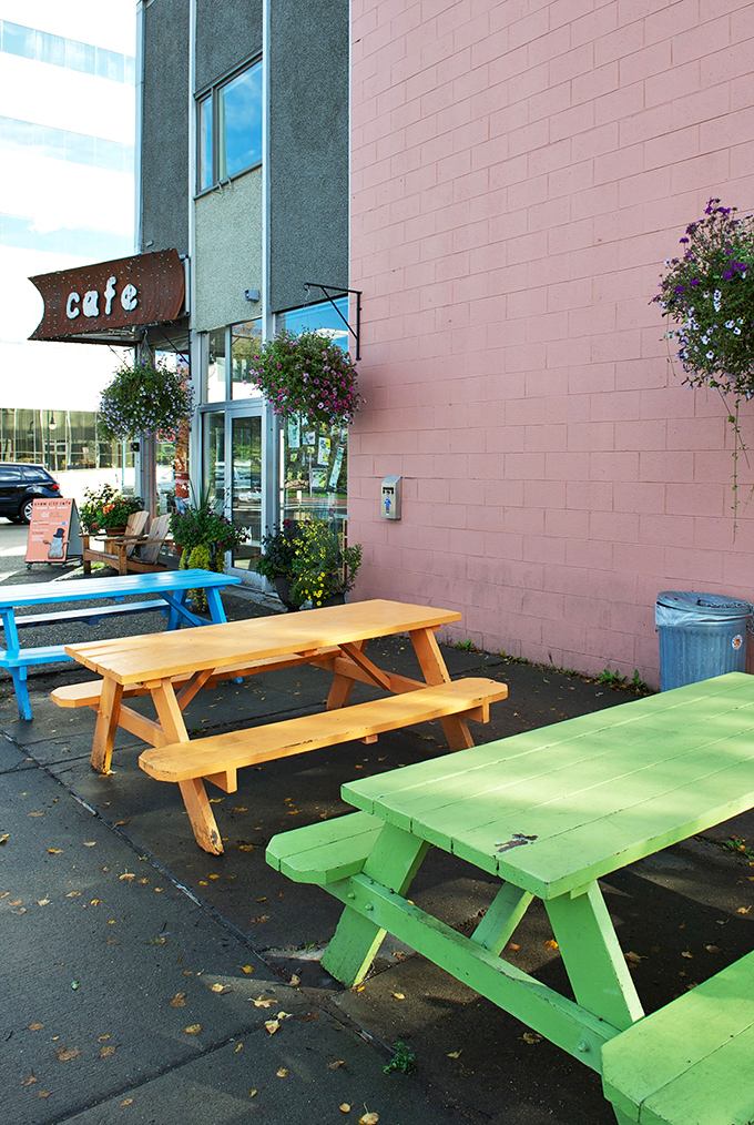 Outdoor seating that's more colorful than a toucan's beak. These picnic tables are perfect for soaking up rare Alaskan sunshine between bites.