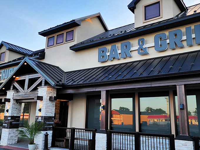 As day turns to night, the real magic begins! Surf & Turf's exterior transforms into a beacon of deliciousness, calling all food lovers.