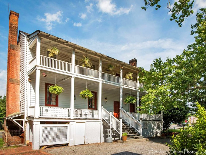 Southern charm personified! This exterior is so inviting, you half expect Scarlett O'Hara to welcome you on the porch.