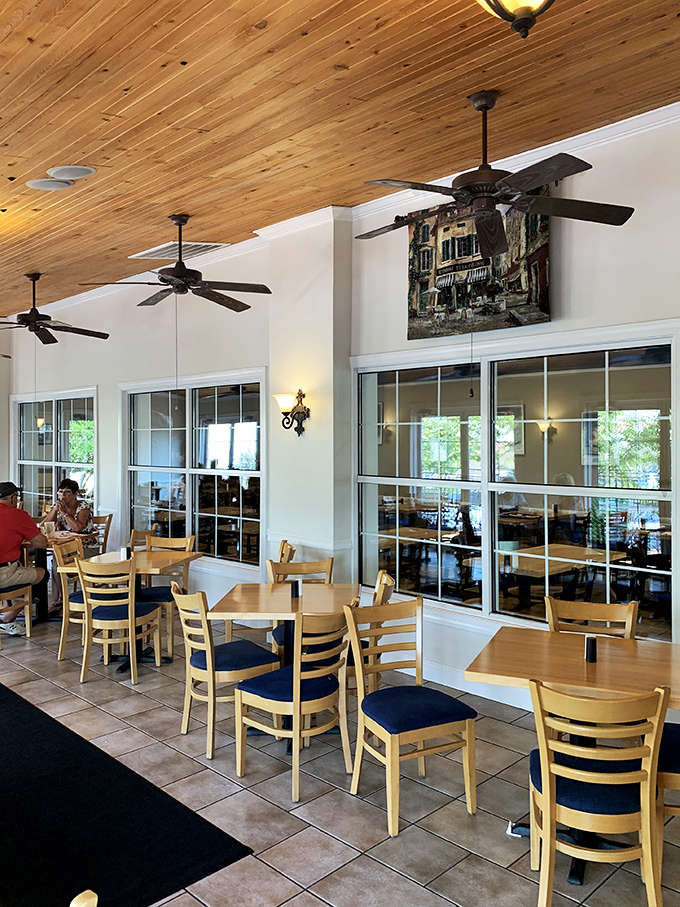 Dine al fresco in Southern style. This patio is so inviting, even the ceiling fans are saying "Y'all come sit a spell!"