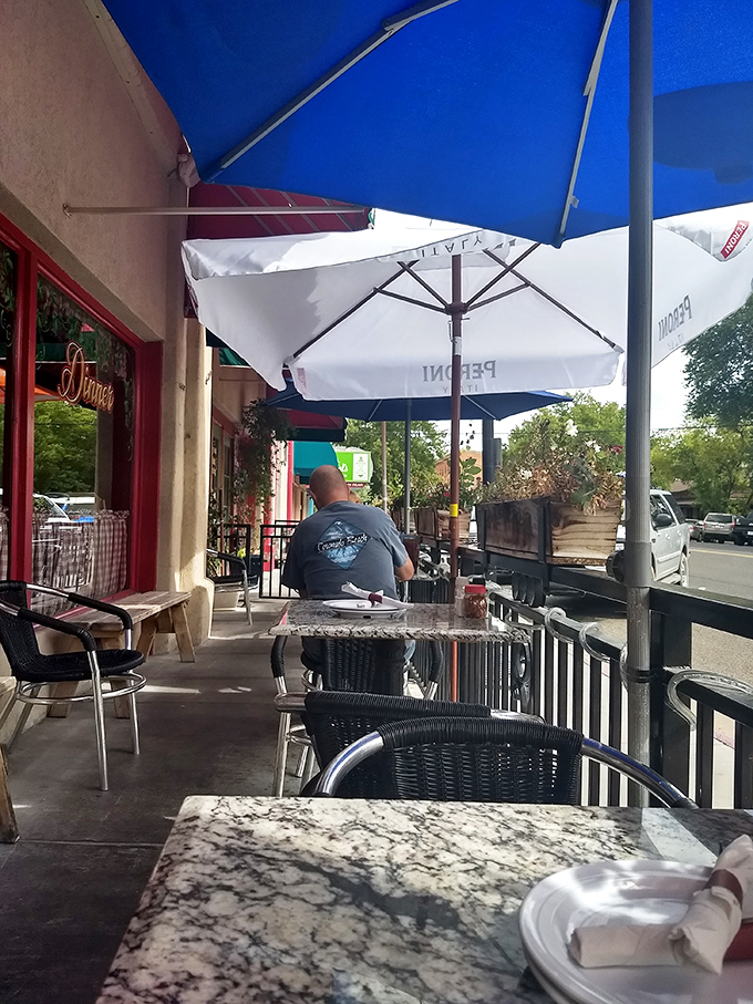Al fresco dining, Rosa's style. This patio is the perfect spot to people-watch while your pizza watches you devour it.