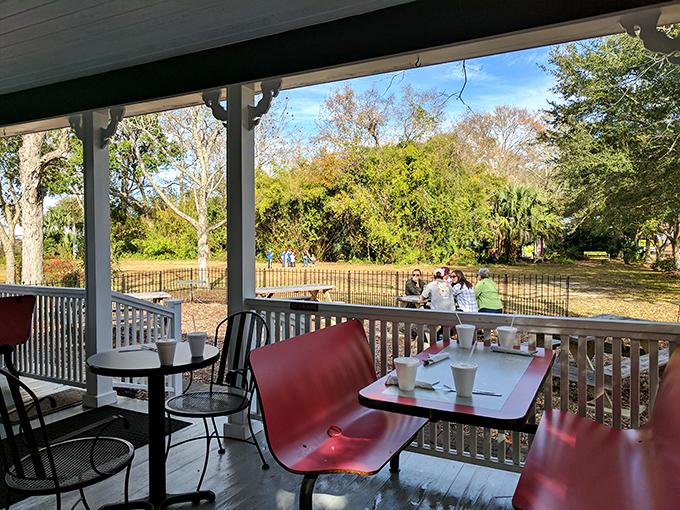 Alfresco dining, Southern style. Where the breeze carries the scent of magnolias and the distant sound of someone saying "y'all" every 30 seconds.