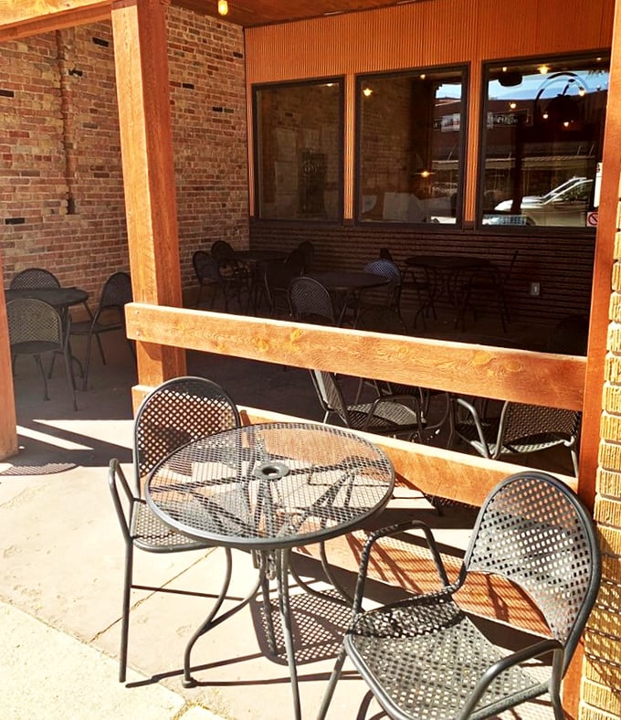 Al fresco dining, Wyoming style. Enjoy your slice with a side of fresh air and small-town charm on this inviting patio.