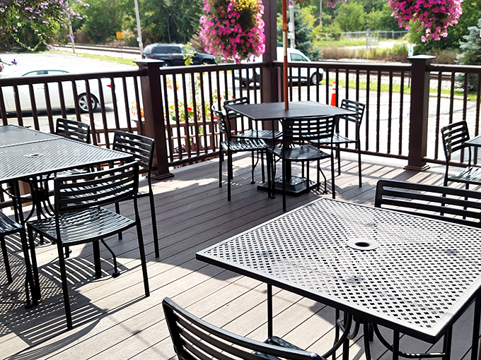 Summer in Wisconsin means patio dining at Saz's, where hanging baskets burst with color and barbecue dreams come true in the open air.