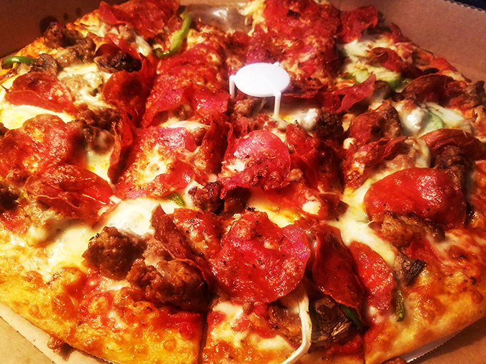 Pizza perfection! This cheesy, saucy, meaty masterpiece is proof that sometimes the best things in life come in circular form.