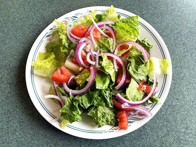 A side salad that's anything but a sidekick. This fresh ensemble steals the scene with every crisp, colorful bite.