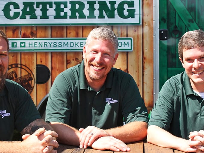 Meet the maestros of meat! These friendly faces are the unsung heroes behind Henry's mouthwatering creations, serving up smiles and smoky delights.