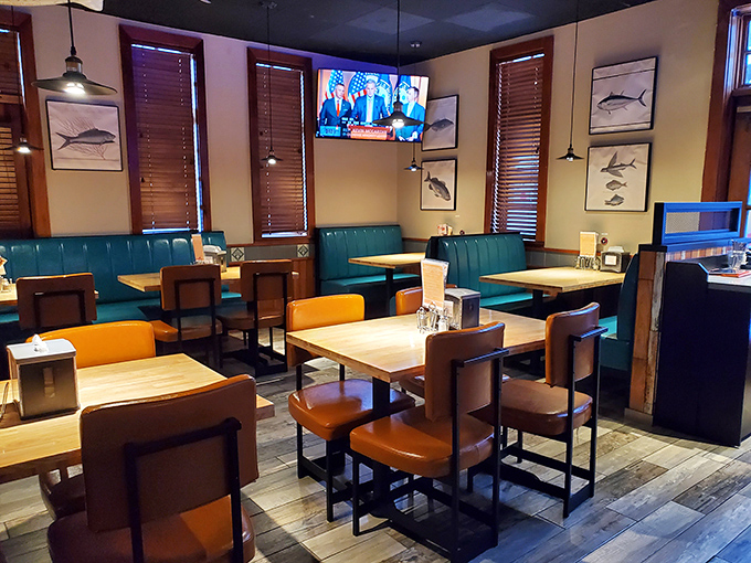 "Cozy booths and nautical vibes: It's like dining in the world's comfiest submarine. Dive in!"
