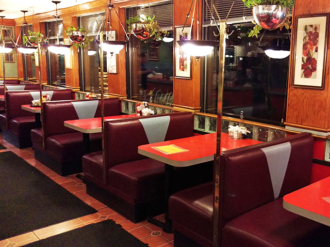 Booths of dreams and schemes! These cozy nooks have probably witnessed more brilliant ideas (and first dates) than a Silicon Valley coffee shop. Extra points for mood lighting.