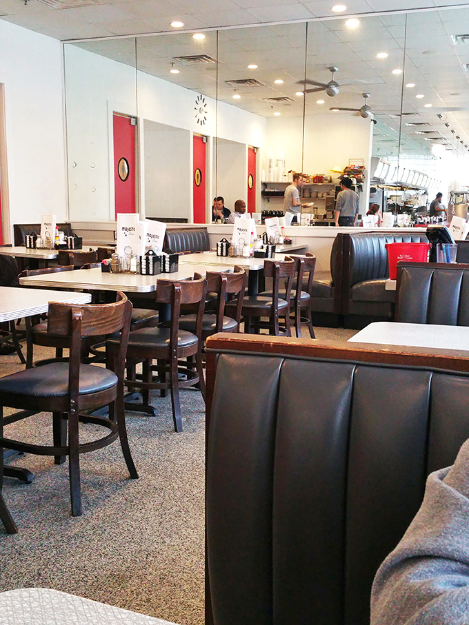 A feast for the eyes and the stomach! The Majestic's dining room is a cozy haven of retro charm, inviting you to slide into a booth and stay awhile.