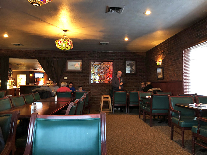 Green booths, brick walls, and warm lighting create an atmosphere cozier than your favorite sweater. It's like dining in a hug.