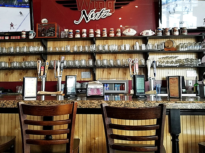 Behind this bar, beer taps stand at attention like soldiers ready to complement wing flavors with hoppy reinforcements.