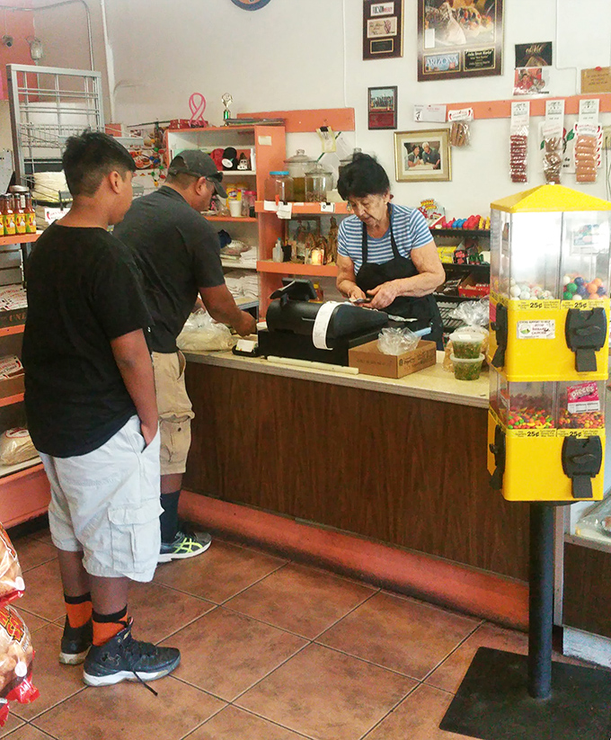 Where the magic happens! These talented folks aren't just cooks, they're flavor wizards, conjuring up deliciousness with every order.