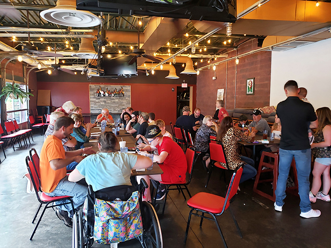 The dining room buzzes with the unmistakable energy of people having genuinely good times over genuinely good food. No Instagram posing detected.