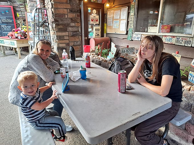 Happy campers at the mac and cheese mecca. This family scene proves that the way to everyone's heart is through their stomach &ndash; especially when cheese is involved.