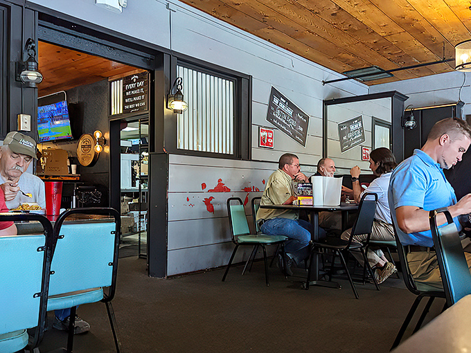 A dining room where strangers become friends, united by the universal language of "mmm" and "pass the napkins, please."