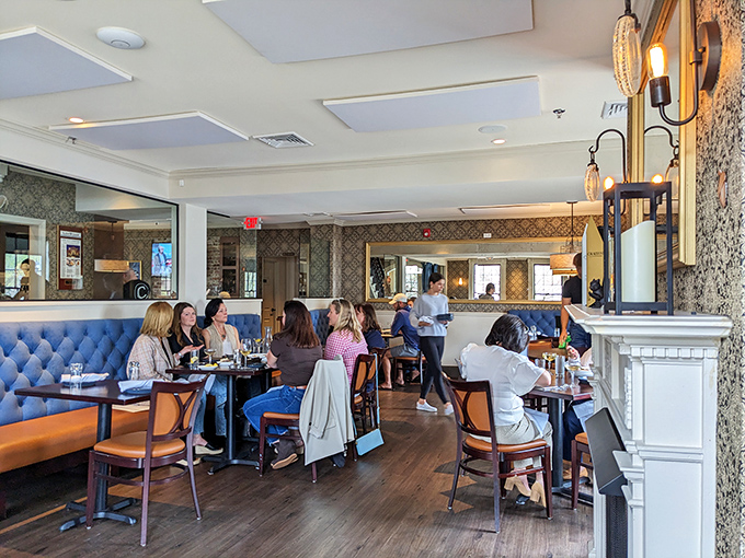 A symphony of satisfied diners! The Charles' dining room buzzes with the happy hum of folks discovering their new favorite dish. Can you hear the forks scraping plates?