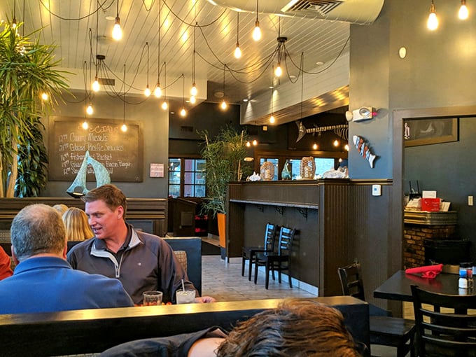 A dining room buzzing with the energy of happy eaters. It's like a seafood-themed block party, minus the sunburn and sand in uncomfortable places.