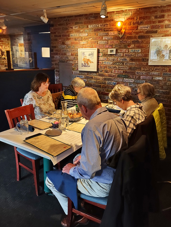 A scene straight out of a Norman Rockwell painting, if Norman had a thing for fantastic seafood and brick walls.