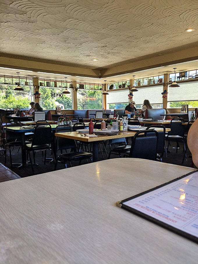 Diner paradise found! Sam's sunny interior invites you to slide into a booth and stay awhile.