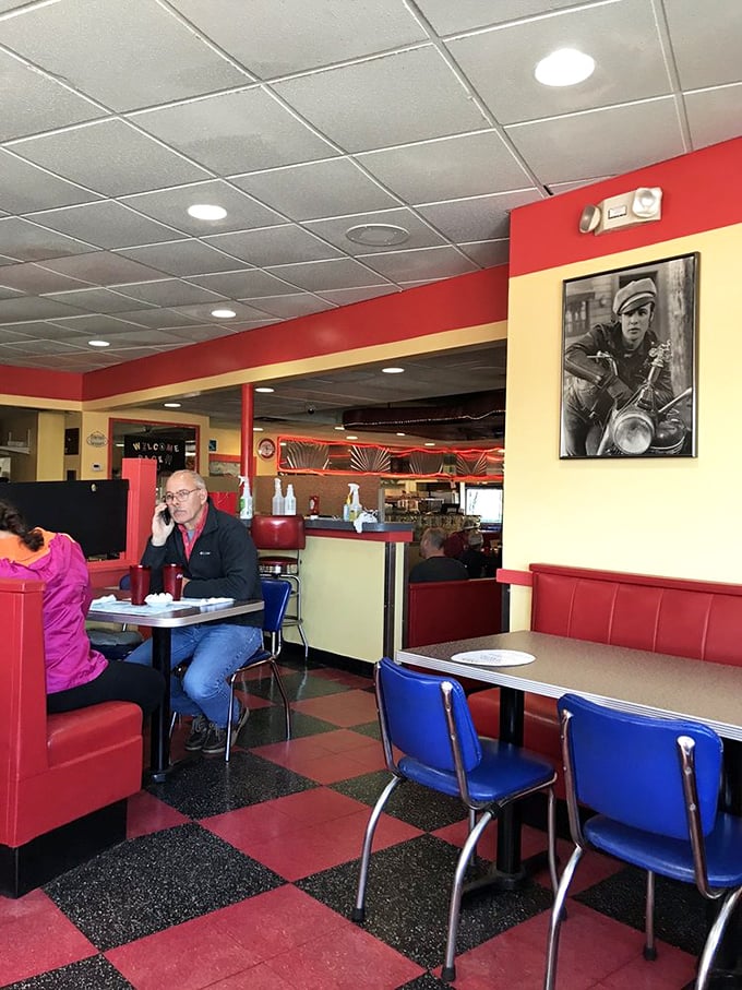 Red booths, blue chairs, and hungry patrons. It's like a Norman Rockwell painting come to life &ndash; with better food!