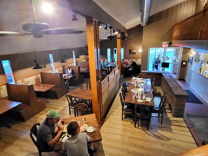 Where the magic happens! The staff at Joe & Pat's are the unsung heroes, turning dough into dreams one pie at a time.