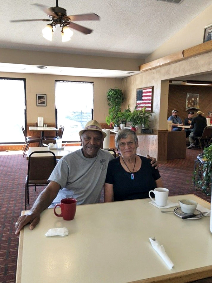 Happy diners alert! These folks look like they've discovered the secret to eternal happiness - and it's BBQ-shaped.