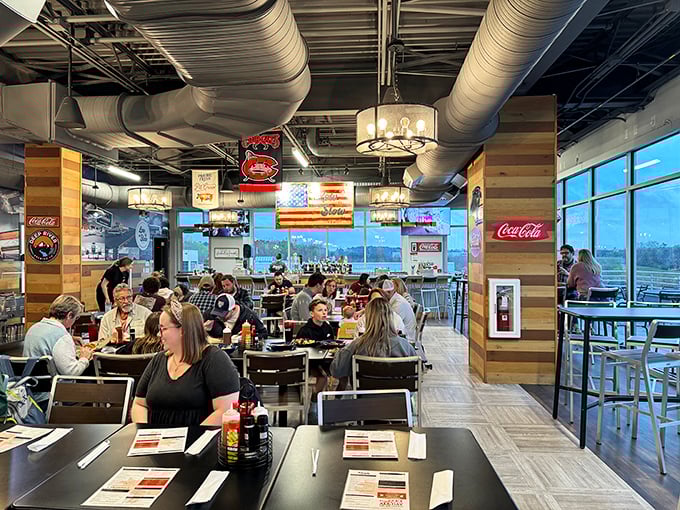 A bustling dining room where strangers become friends over shared love of smoky goodness. It's like a barbecue block party!