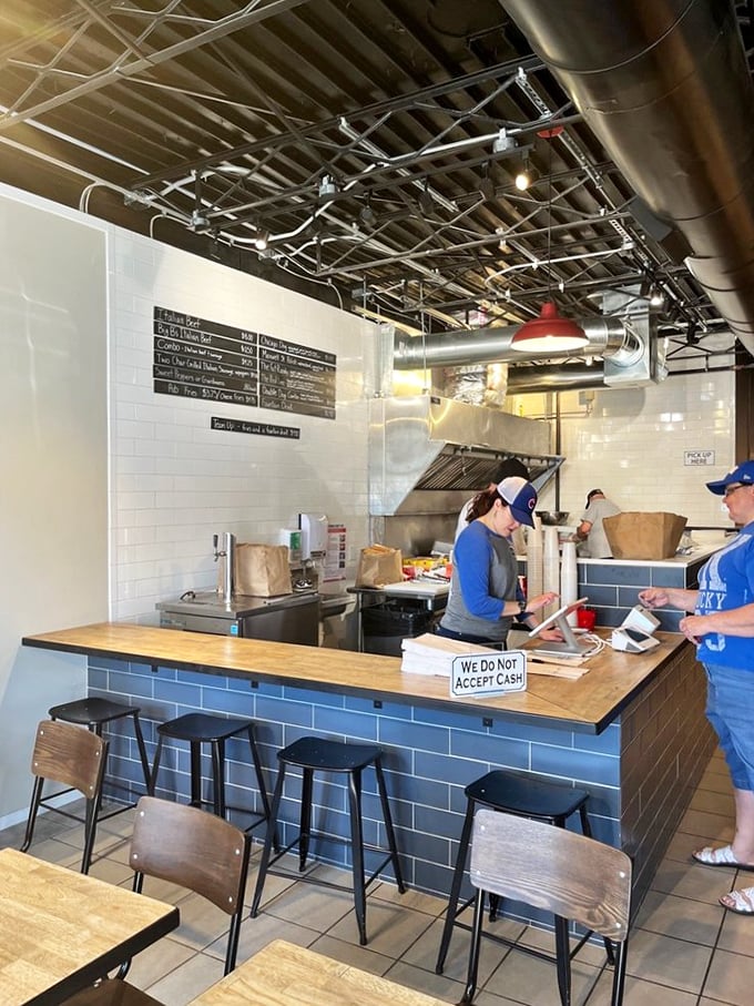 Where the magic happens! These culinary wizards are serving up slices of happiness faster than you can say "Go Cubs!"