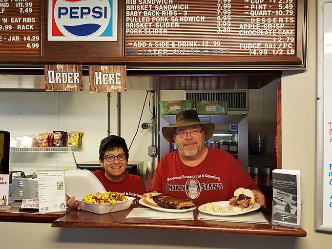 Meet the maestros of meat! These friendly faces are the unsung heroes behind every finger-licking, lip-smacking bite at Smokin Stan's.