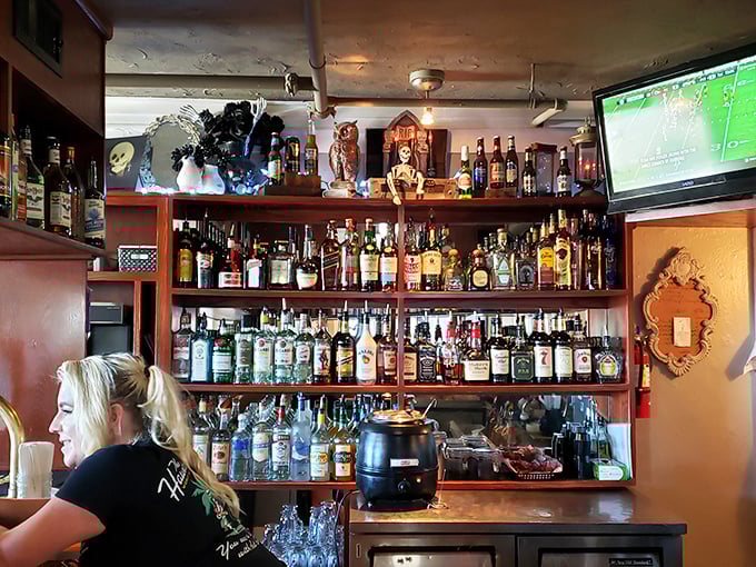 Behind the bar, where spirits meet spirits. With a selection this good, you might just see pink elephants instead of ghosts.