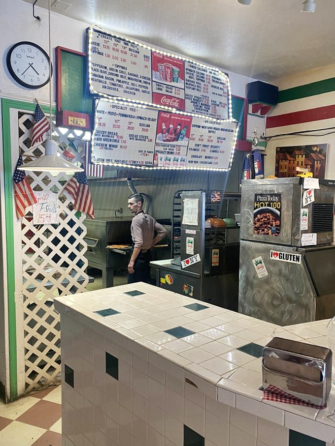 Behind the scenes of deliciousness! Watch the pizza maestro work his magic, turning dough into edible art.
