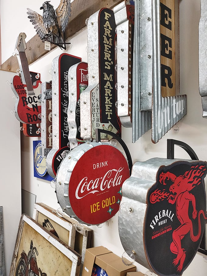 Sign of the times! This wall of vintage Americana isn't just decor; it's a crash course in pop culture history, served with a side of nostalgia.