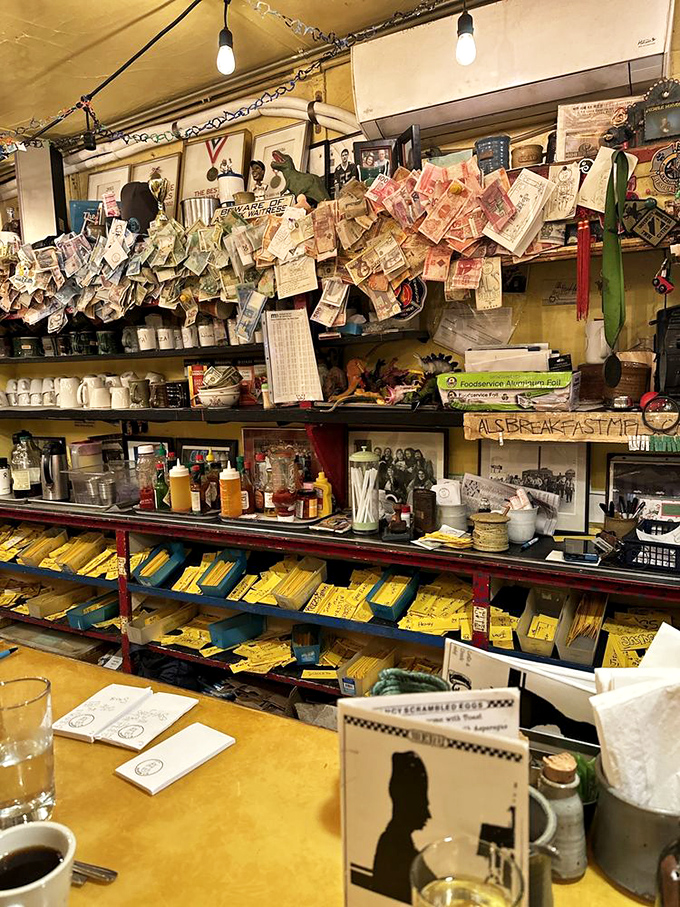 Money on the ceiling? It's not a bank, it's breakfast memorabilia! Each dollar tells a story&hellip; probably about really great pancakes.