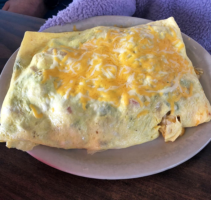 The five-item omelet: Because sometimes you can't decide, so you choose 'all of the above'. A breakfast bursting with indecision.