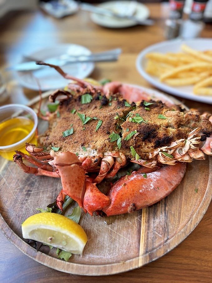 Baked, stuffed, and ready for its close-up! This lobster is so beautifully prepared, it deserves its own Instagram account. #LobsterGoals
