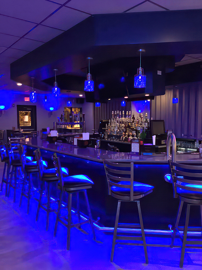 A bar that glows bluer than a tropical lagoon. Come for the drinks, stay for the ambiance.