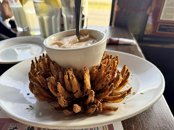 Onion rings? More like onion royalty! This blooming beauty is the crown jewel of appetizers, ready to rule your taste buds.